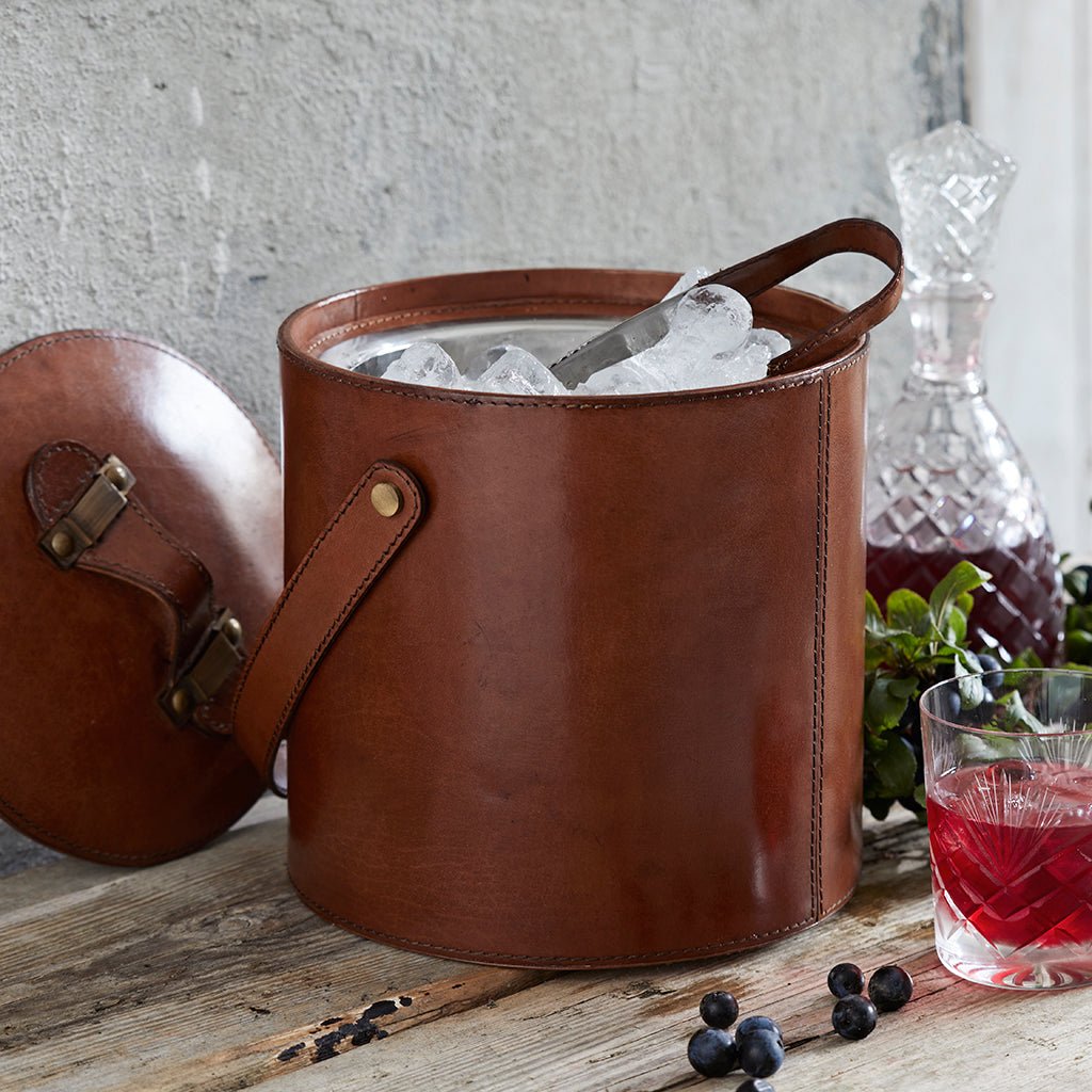 Entertain with leather bar ware, trays, cocktail tools and drinks case