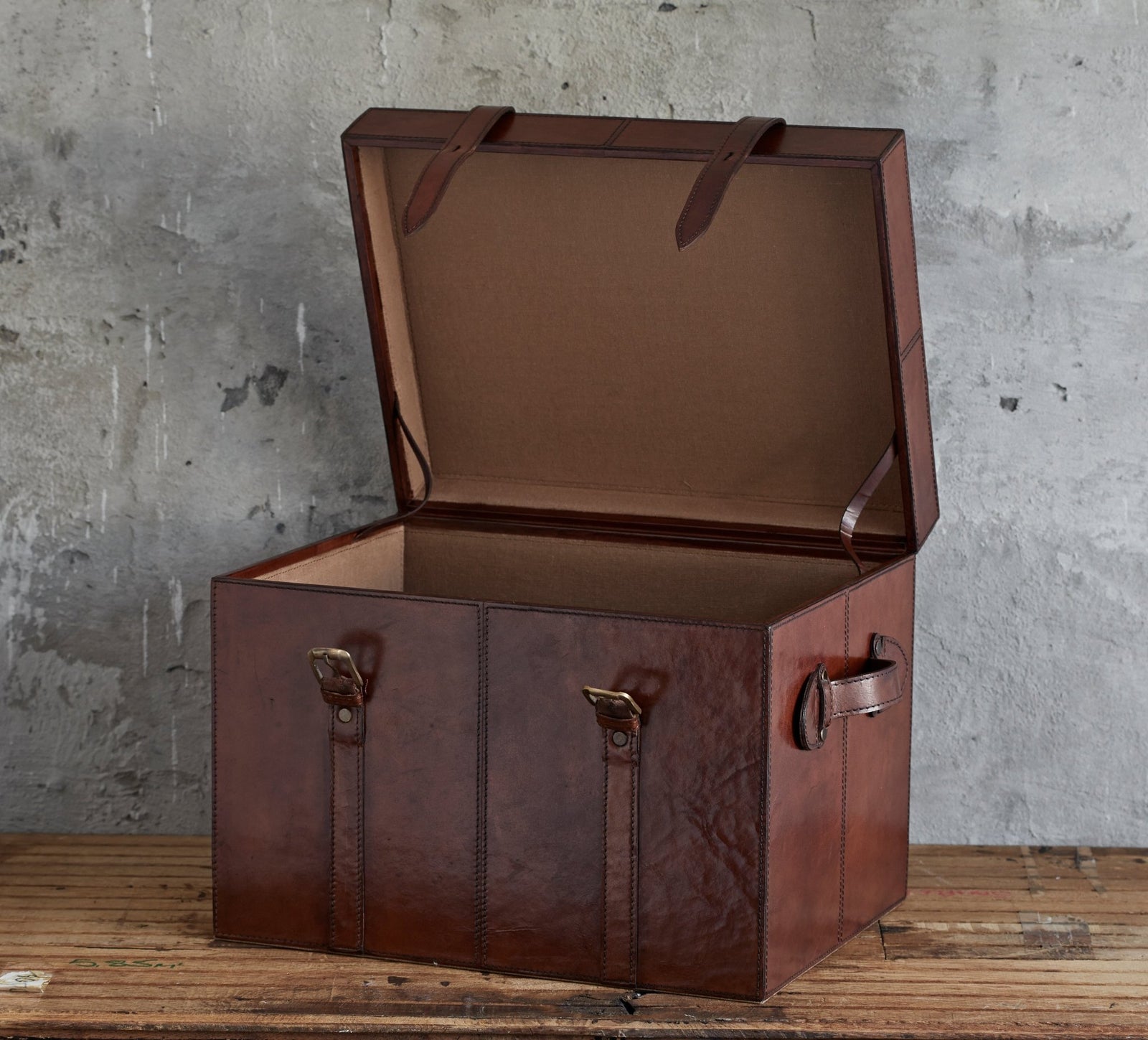 Leather Steamer Trunk. Beautiful outside and in. Our largest storage.